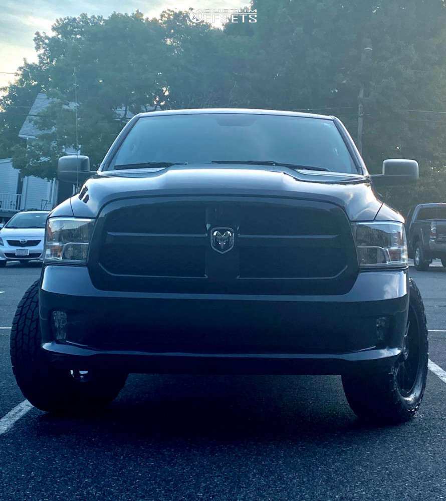 2017 Ram 1500 with 20x9 18 Motiv Offroad Magnus and 33/12.5R20 Cooper ...