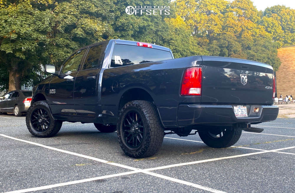 2017 Ram 1500 with 20x9 18 Motiv Offroad Magnus and 33/12.5R20 Cooper ...