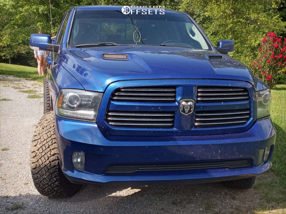 2014 Ram 1500 with 20x10 -25 Vision Razor and 33/12.5R20 Atturo Trail ...