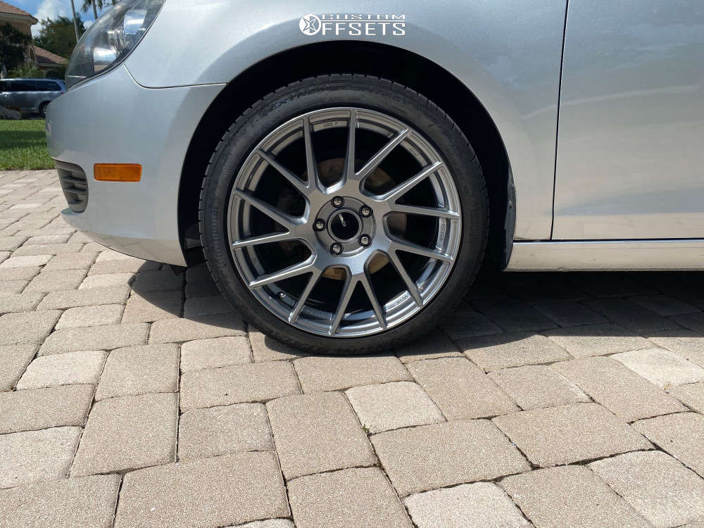2012 Volkswagen Golf with 18x8 45 Enkei Tm7 and 225/40R18 Continental ...