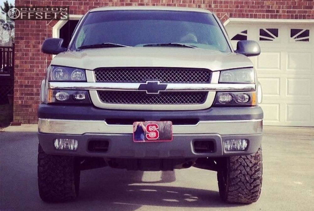 2004 Chevrolet Silverado 1500 with 20x9 18 XD Badlands and 33/12.5R20 ...