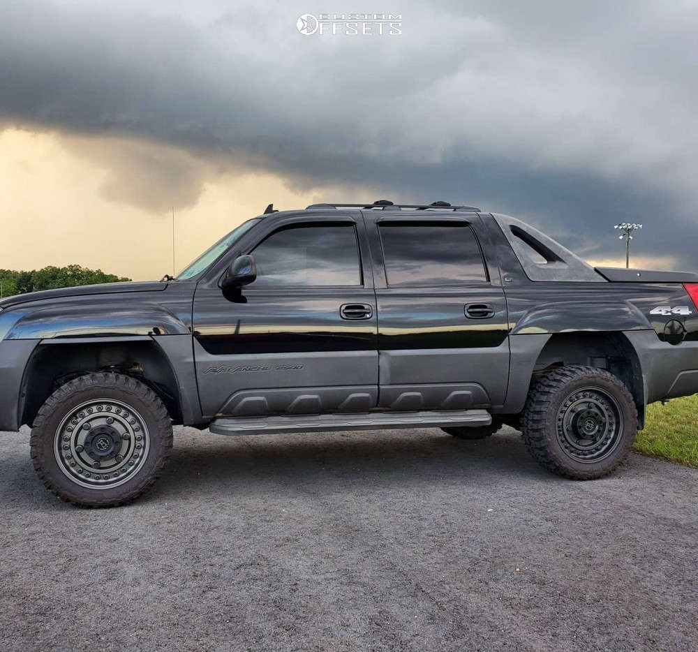 2006 Chevrolet Avalanche 2500 with 20x9.5 6 Black Rhino Armory and 33/ ...
