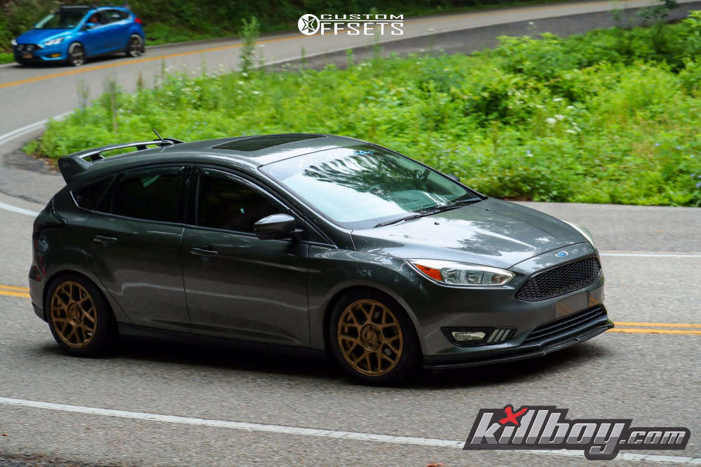2015 Ford Focus with 17x7.5 28 KMC Km708 and 235/50R17 Michelin All ...