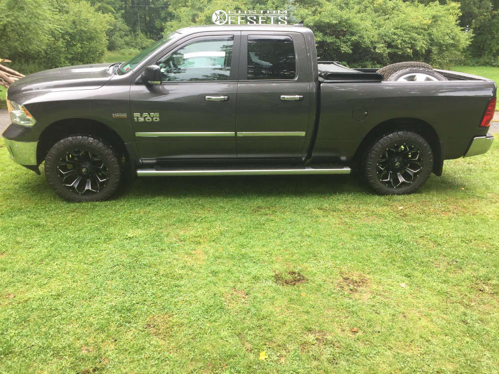2015 Ram 1500 with 20x10 -18 Fuel Assault and 33/12.5R20 Nitto Ridge ...