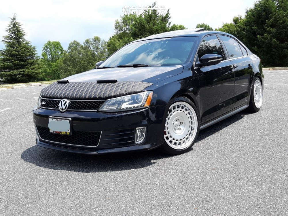 2014 Volkswagen Jetta with 18x8.5 45 Alzor 1365 and 225/40R18 Falken ...
