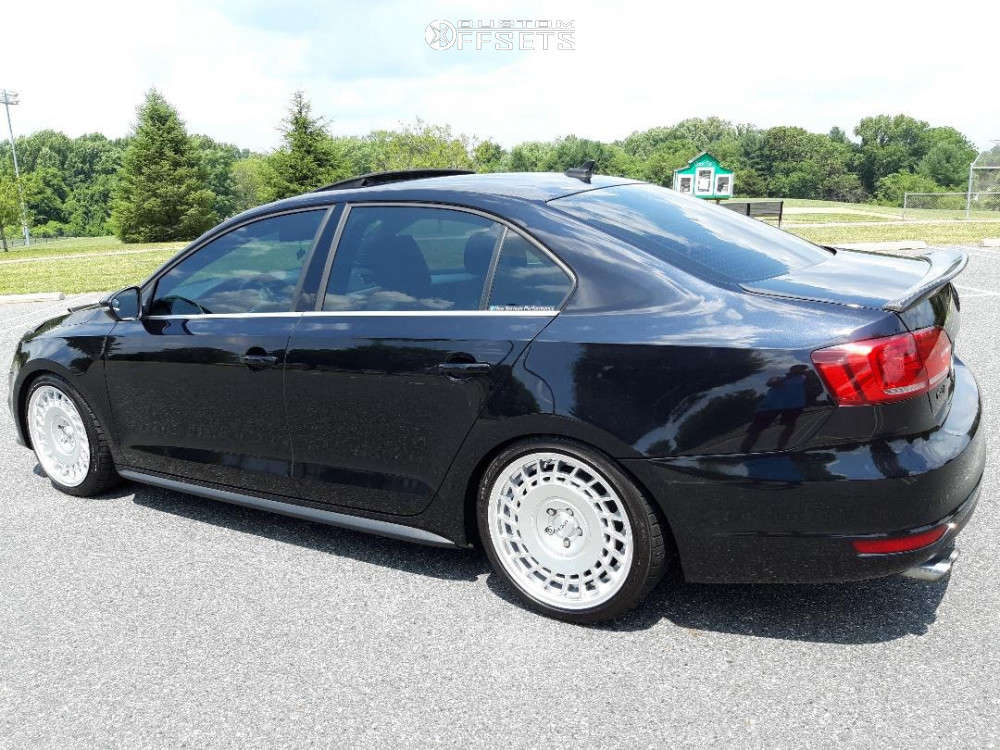 2014 Volkswagen Jetta with 18x8.5 45 Alzor 1365 and 225/40R18 Falken ...