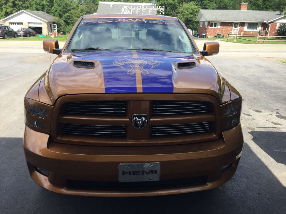 2012 Ram 1500 with 20x10 -12 RBP 94r and 32/11.5R20 Cooper Discoverer ...