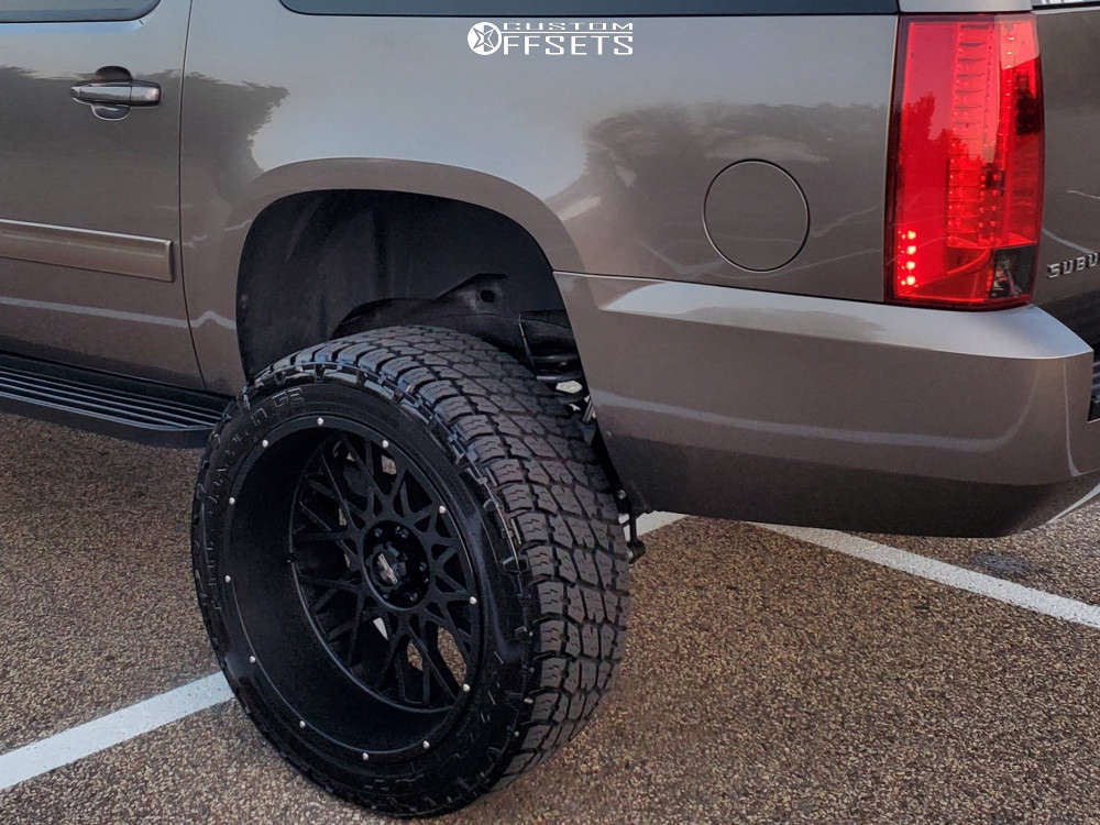 2011 Chevrolet Suburban with 24x12 -51 Vision Rocker and 325/45R24 ...