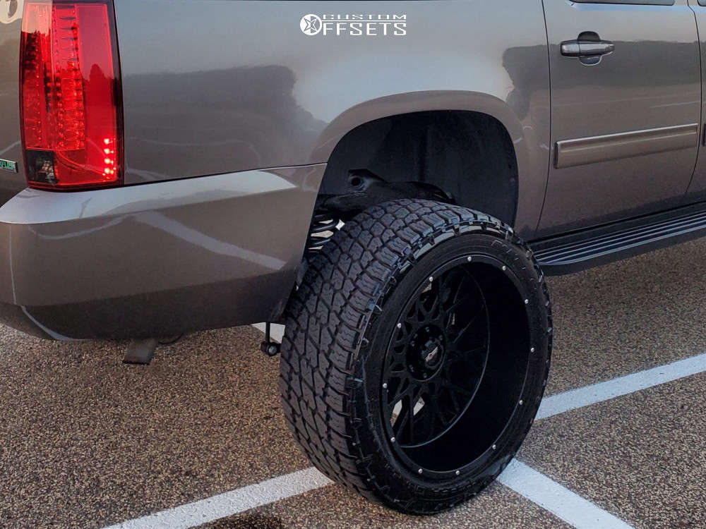 2011 Chevrolet Suburban with 24x12 -51 Vision Rocker and 325/45R24 ...