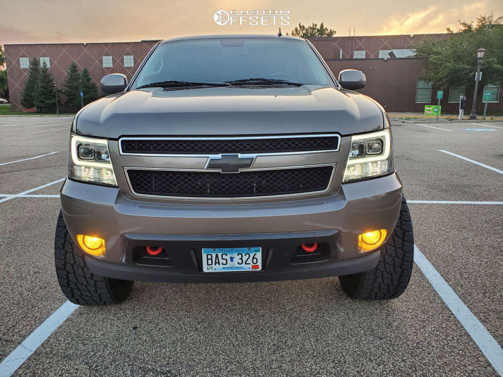 2011 Chevrolet Suburban with 24x12 -51 Vision Rocker and 325/45R24 ...