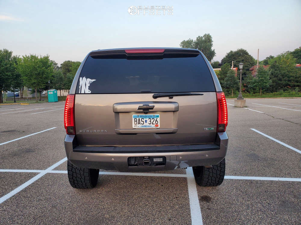 2011 Chevrolet Suburban with 24x12 -51 Vision Rocker and 325/45R24 ...