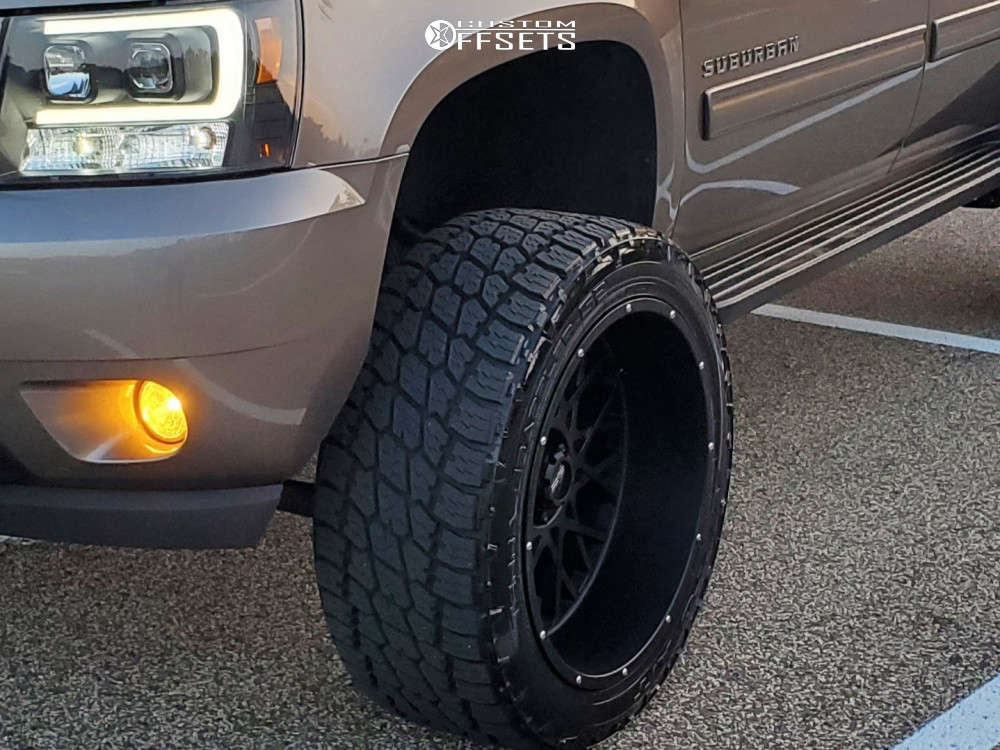 2011 Chevrolet Suburban with 24x12 -51 Vision Rocker and 325/45R24 ...