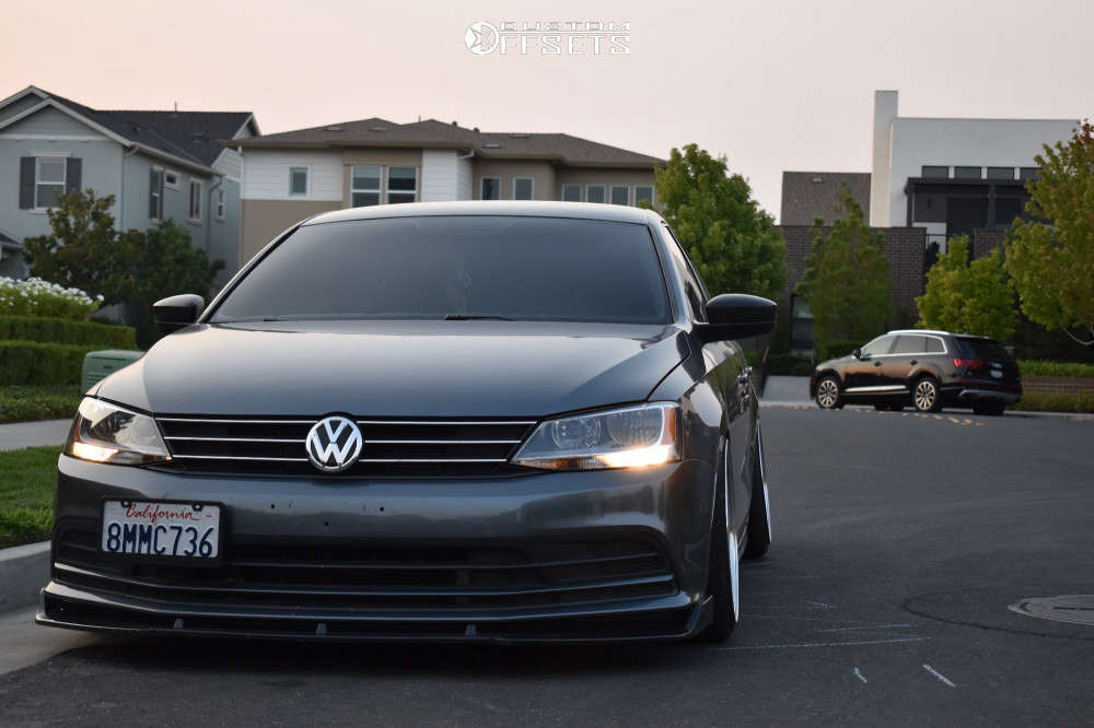2016 Volkswagen Jetta with 18x9.5 20 JNC Jnc004 and 215/35R18 Accelera ...