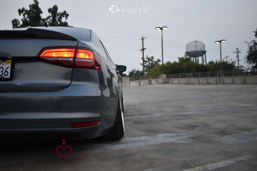 2016 Volkswagen Jetta with 18x9.5 20 JNC Jnc004 and 215/35R18 Accelera ...