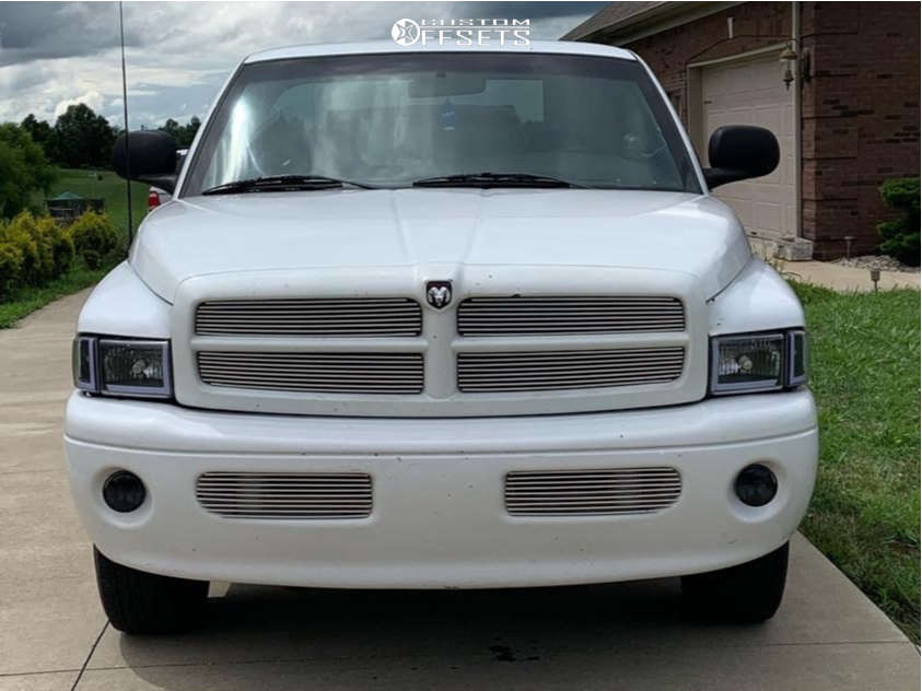 1998 Dodge Ram 1500 with 20x10 -25 Vision Spyder and 265/45R20 Toyo ...