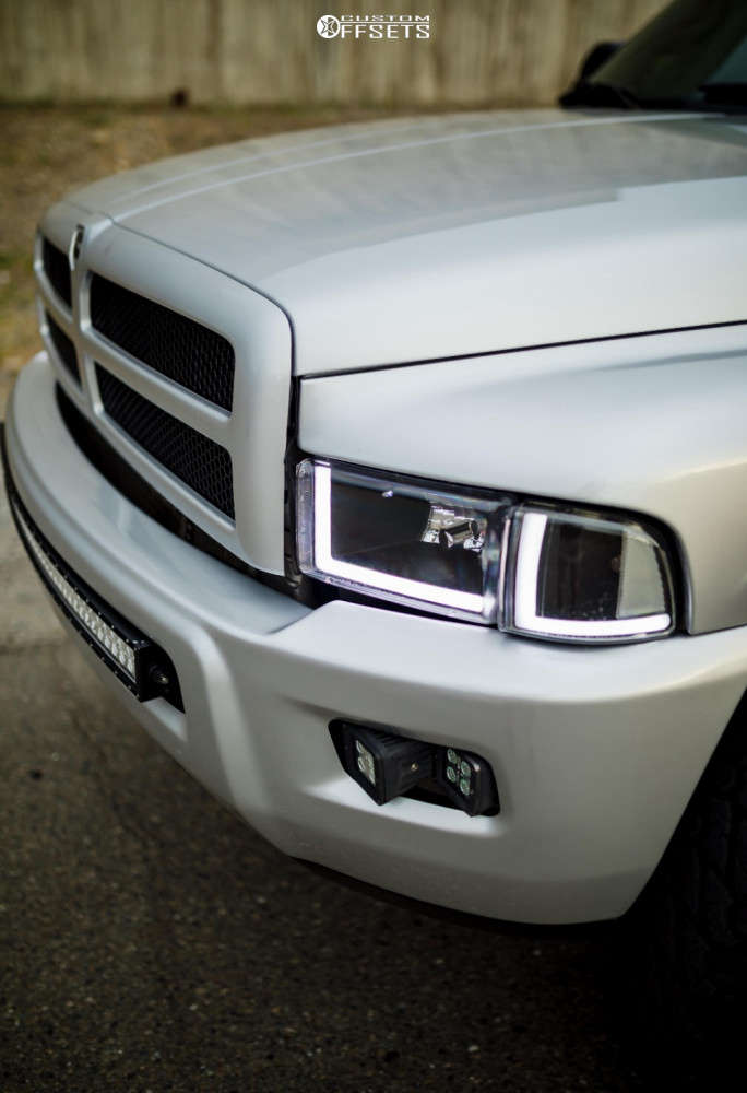 2002 Dodge Ram 2500 with 18x9 -12 XD Grenade and 35/12.5R18 Atturo ...