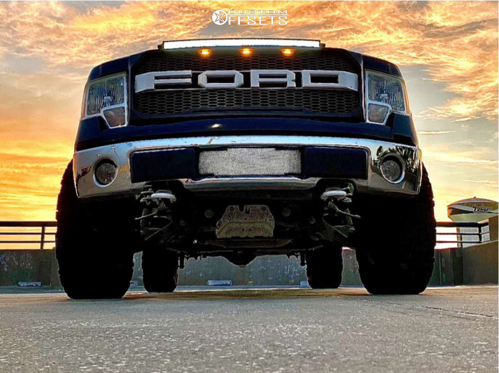 2011 Ford F-150 with 17x9 -12 KMC Monster XD and 35/12.5R17 Nitto Mud ...