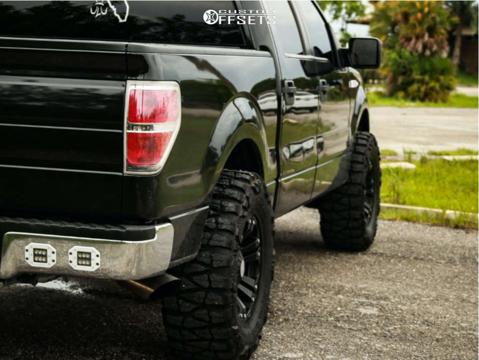 2011 Ford F-150 with 17x9 -12 KMC Monster XD and 35/12.5R17 Nitto Mud ...
