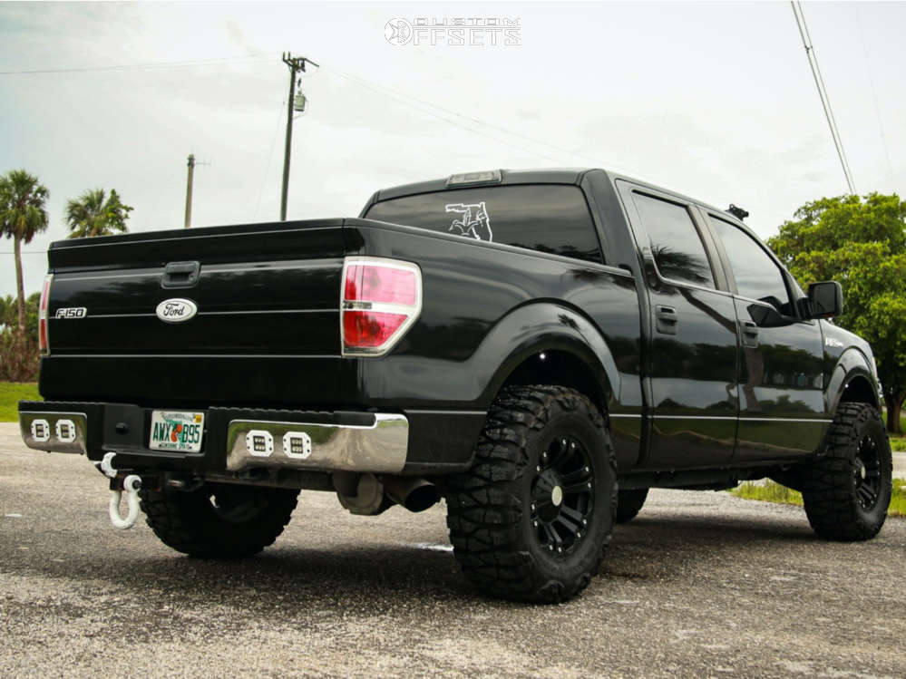 2011 Ford F-150 with 17x9 -12 KMC Monster XD and 35/12.5R17 Nitto Mud ...