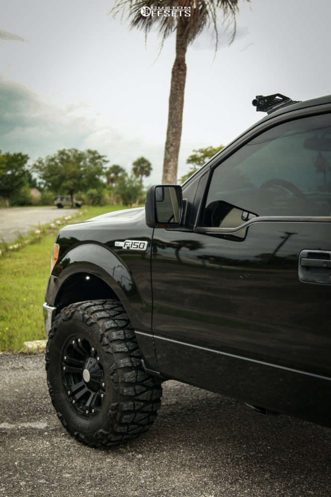 2011 Ford F-150 with 17x9 -12 KMC Monster XD and 35/12.5R17 Nitto Mud ...