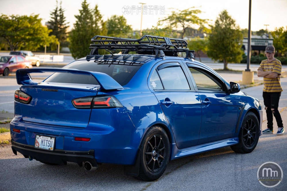 2011 Mitsubishi Lancer with 16x7 45 Enkei Edr9 and 215/60R16 General ...