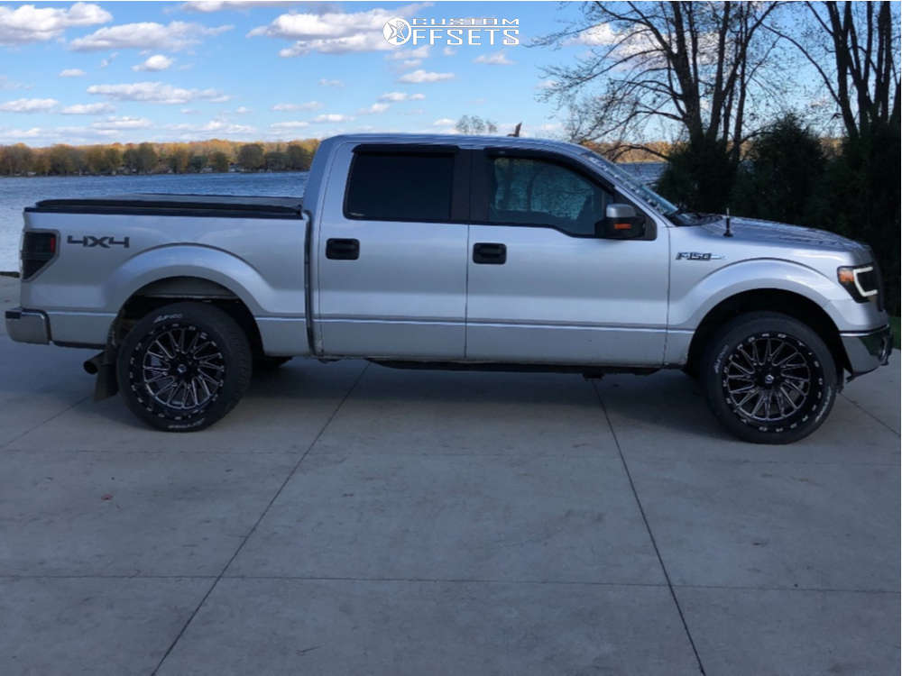 2011 Ford F-150 with 22x12 -44 TIS 547BM and 32/11.5R22 Atturo Az800 ...