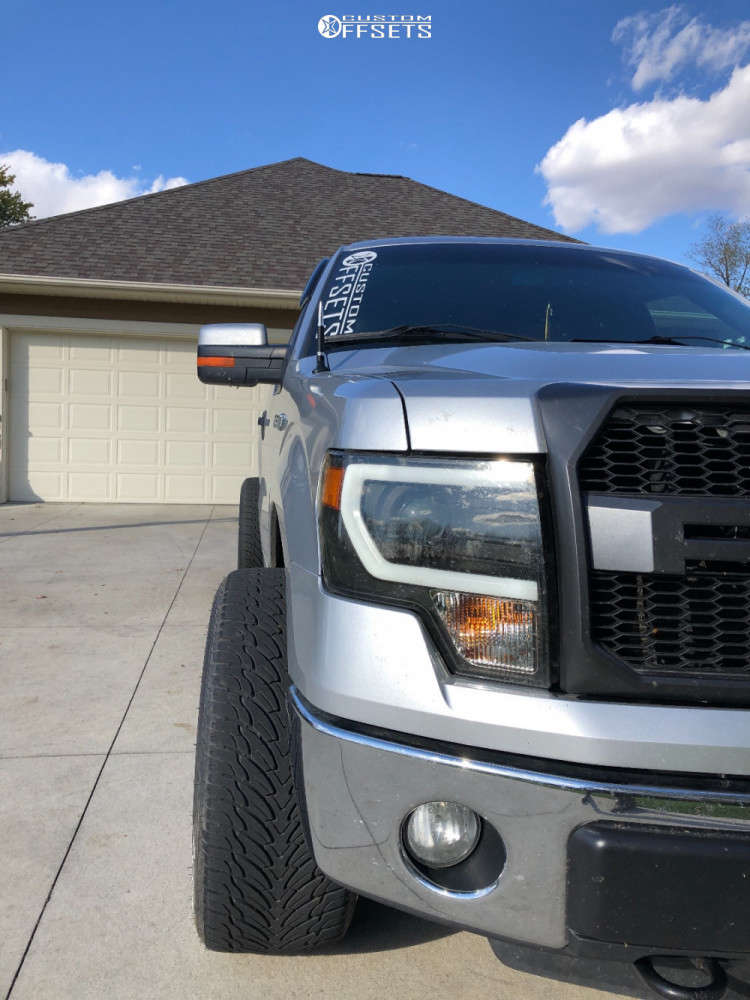 2011 Ford F-150 with 22x12 -44 TIS 547BM and 32/11.5R22 Atturo Az800 ...