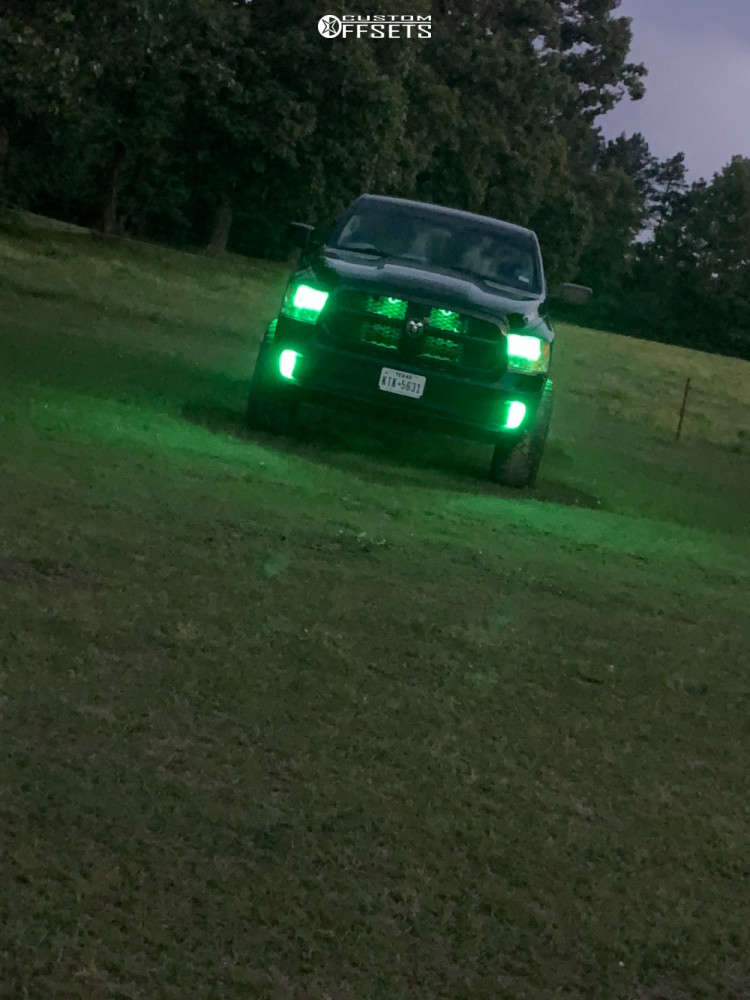 2018 Ram 1500 with 20x12 -44 American Truxx Web and 35/12.5R20 ...