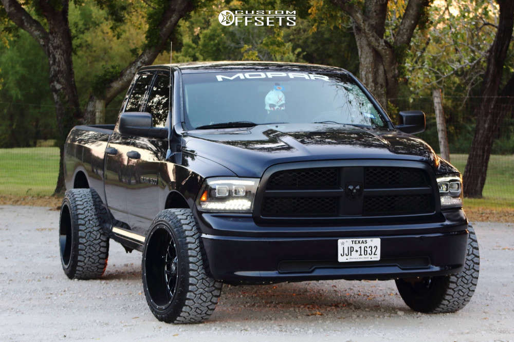 2012 Ram 1500 with 22x12 -44 Xtreme Mudder Xm-328 and 33/12.5R22 Fury ...