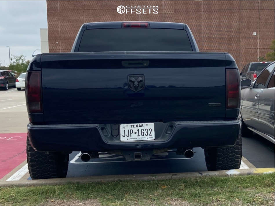 2012 Ram 1500 with 22x12 -44 Xtreme Mudder Xm-328 and 33/12.5R22 Fury ...