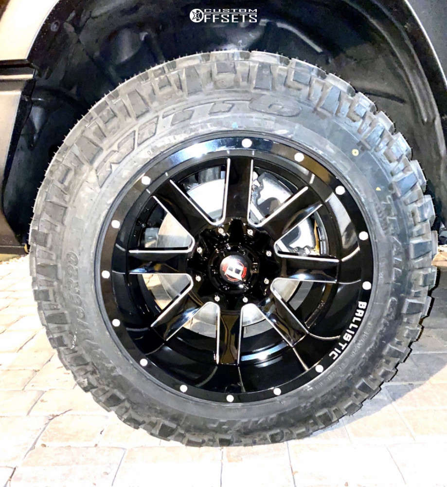 2019 Ram 1500 with 20x12 -44 Ballistic Rage and 35/12.5R20 Nitto Trail ...