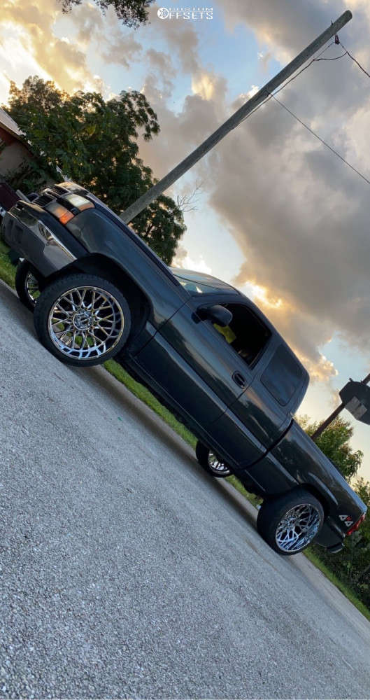 2005 Chevrolet Silverado 1500 with 24x12 -51 Vision Rocker and 305 ...