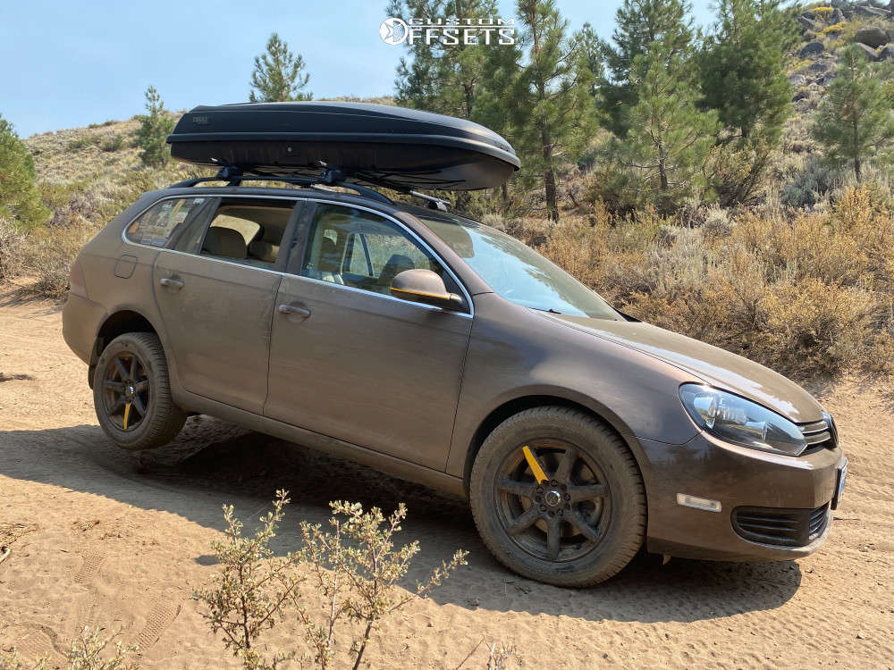 2012 Volkswagen Jetta with 16x7 20 Raceline Evo and 215/60R16 Yokohama ...