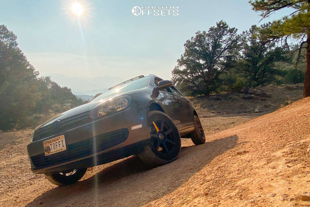 2012 Volkswagen Jetta with 16x7 20 Raceline Evo and 215/60R16 Yokohama ...