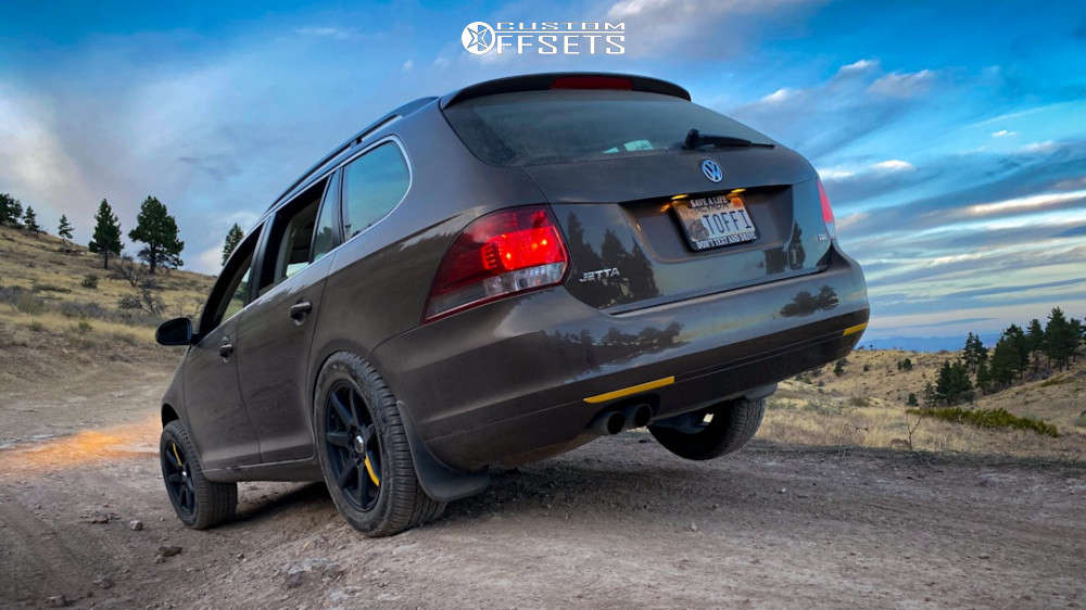 2012 Volkswagen Jetta with 16x7 20 Raceline Evo and 215/60R16 Yokohama ...