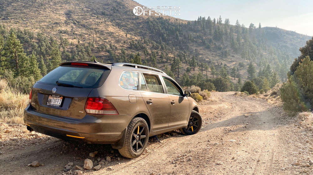 2012 Volkswagen Jetta with 16x7 20 Raceline Evo and 215/60R16 Yokohama ...