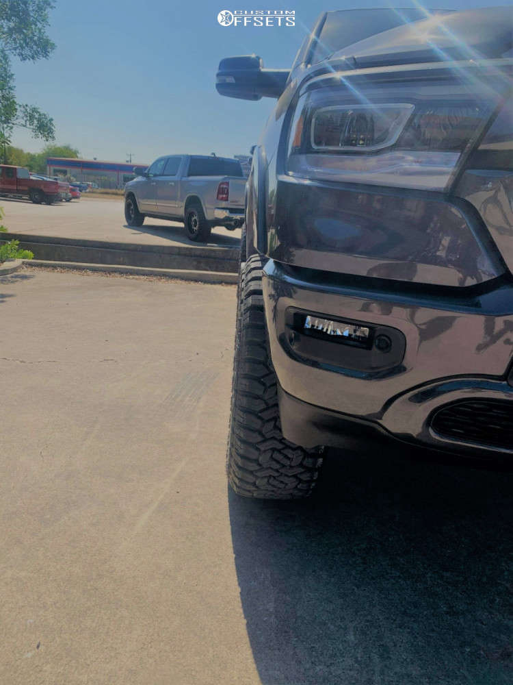 2020 Ram 1500 with 20x9 1 Fuel Covert and 35/12.5R20 Fury Offroad ...