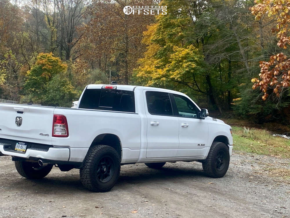 2019 Ram 1500 with 18x9 -12 Vision Split and 35/12.5R18 Falken Wildpeak ...