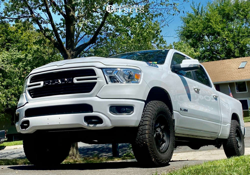 2019 Ram 1500 with 18x9 -12 Vision Split and 35/12.5R18 Falken Wildpeak ...