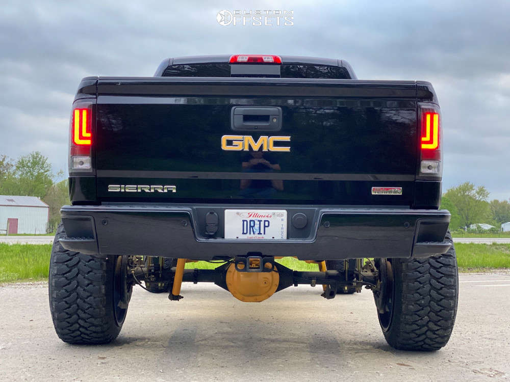 2016 GMC Sierra 1500 with 24x14 -71 Tuff T2a and 35/12.5R24 Comforser Cf3000 and Suspension Lift ...