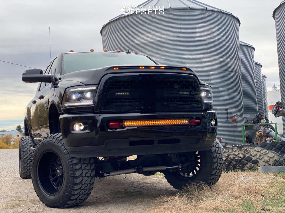 2013 Ram 3500 with 20x12 -44 V-Rock Anvil and 37/13.5R20 AMP Mud ...