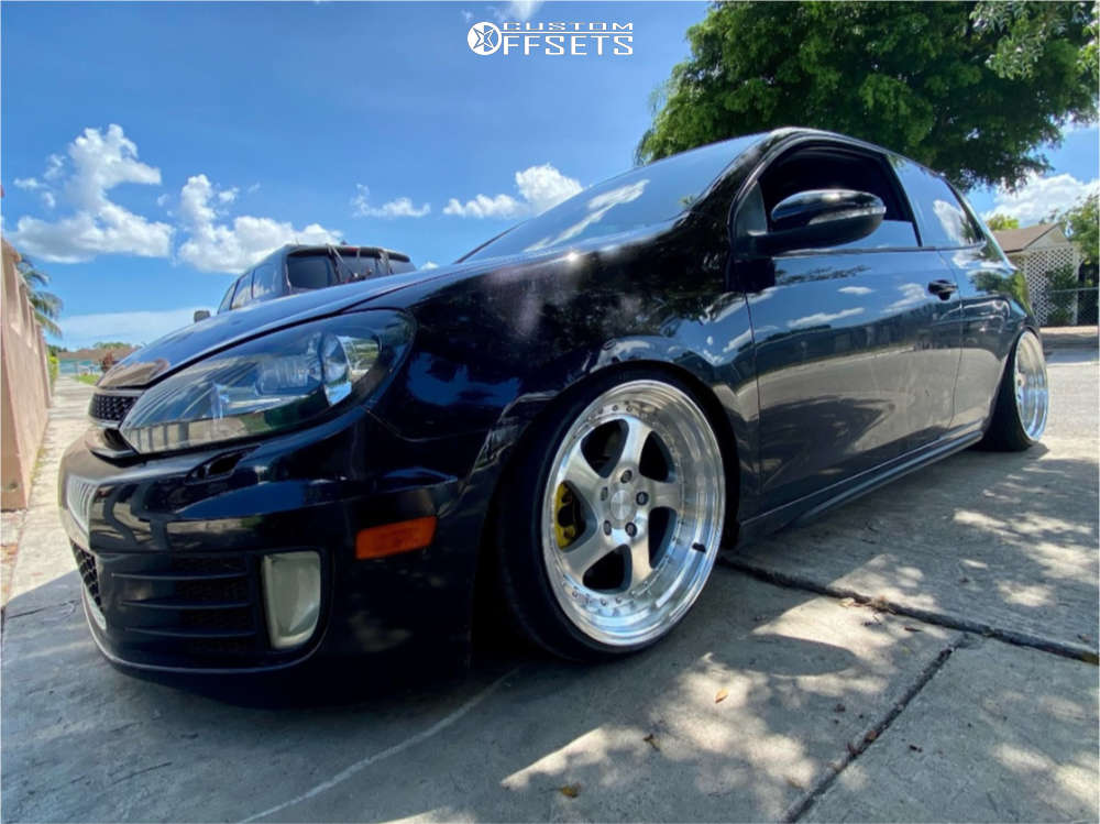 2010 Volkswagen GTI with 18x9.5 30 ESR Sr02 and 215/35R18 Landsail ...