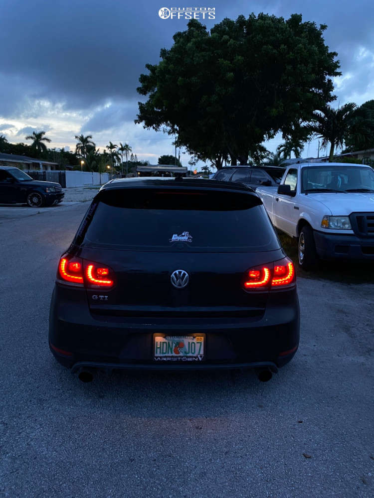 2010 Volkswagen GTI with 18x9.5 30 ESR Sr02 and 215/35R18 Landsail ...