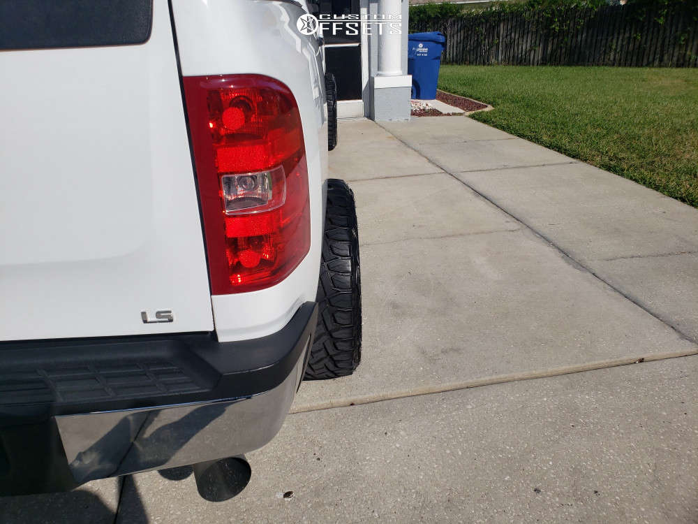 2014 Chevrolet Silverado 2500 HD with 20x12 -44 Dropstars 655bm and 33/ ...