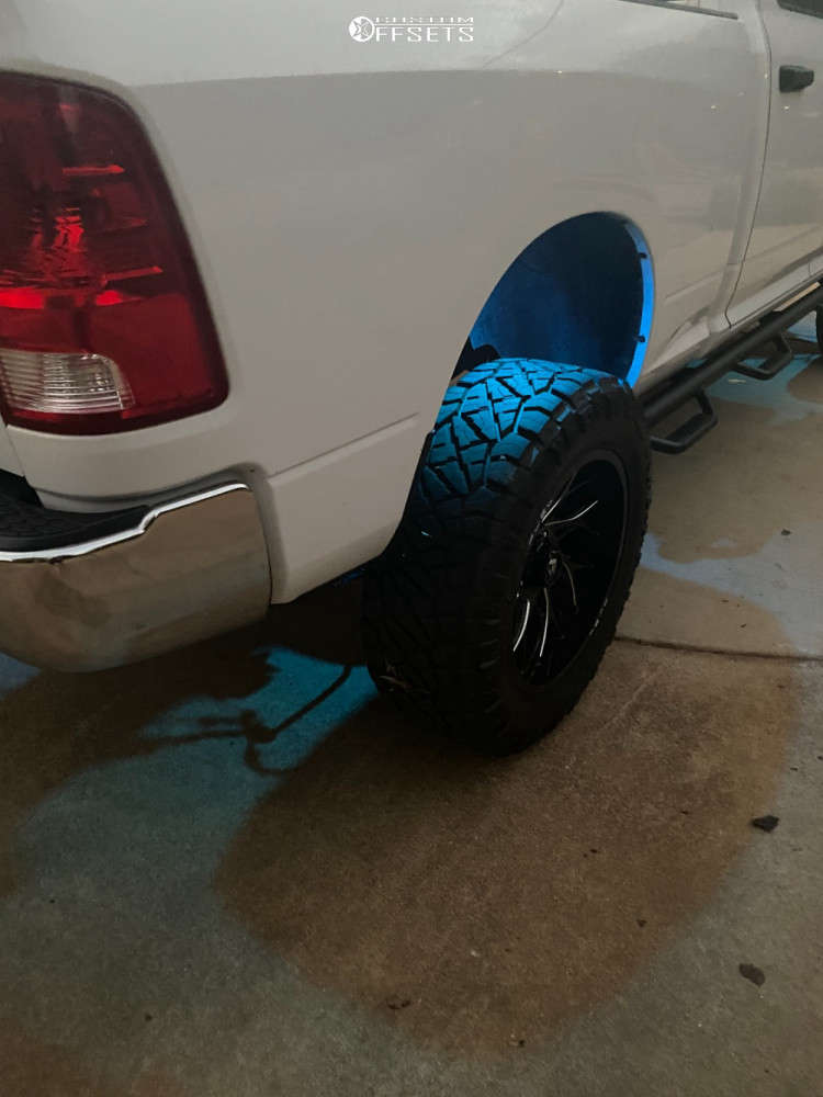 2016 Ram 1500 with 22x10 -18 Fuel Runner and 37/12.5R22 Nitto Ridge ...