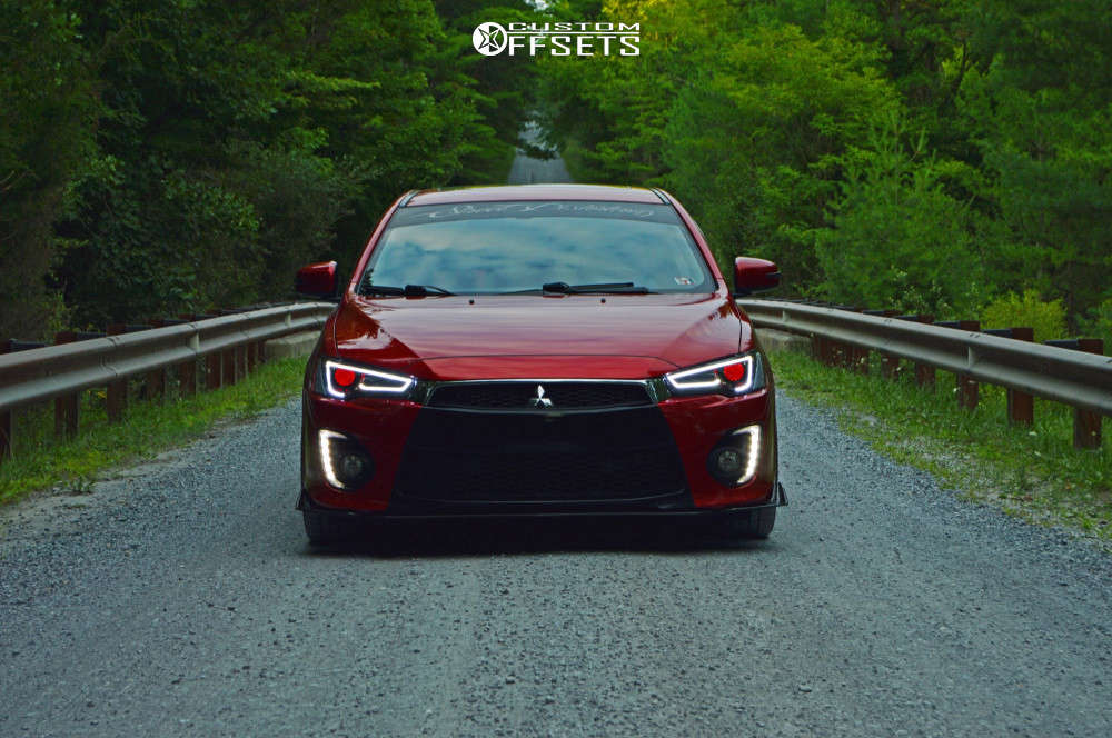 2016 Mitsubishi Lancer with 18x8.5 38 F1R F29 and 235/45R18 Cooper Zeon ...