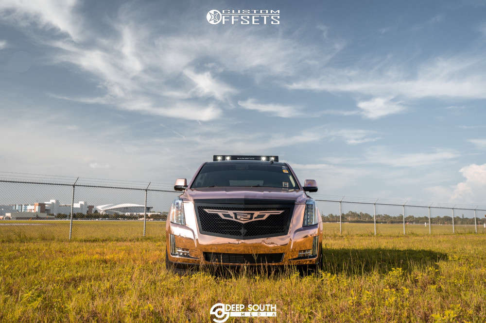 2016 Cadillac Escalade with 24x10 30 DUB Chedda and 295/35R24 Nitto ...