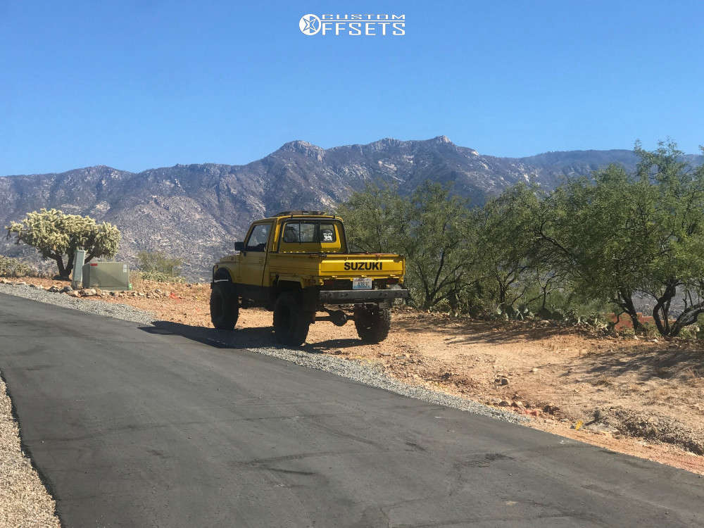 1985 Suzuki SJ413 with 15x7 0 Black Iron Magnum and 32/9.5R15 Super ...