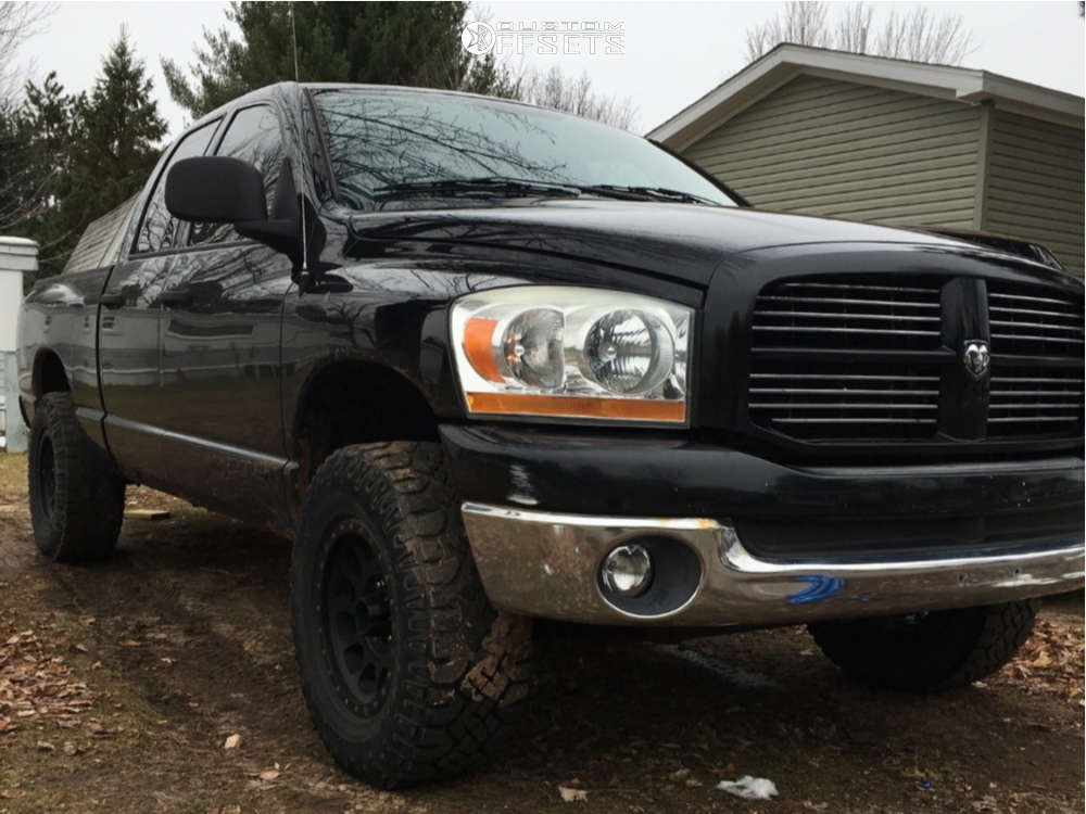 2006 Dodge Ram 1500 with 17x8.5 -25 Method Nv and 265/70R17 Goodyear ...
