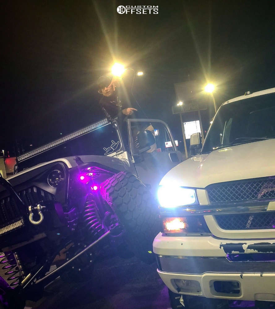 2004 Chevrolet Silverado 1500 with 20x10 -24 KMC Rockstar and 37/12 ...